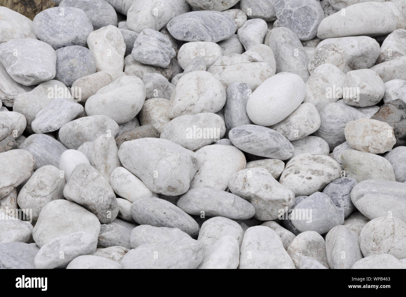 Sea white stones spread background abstract Stock Photo - Alamy