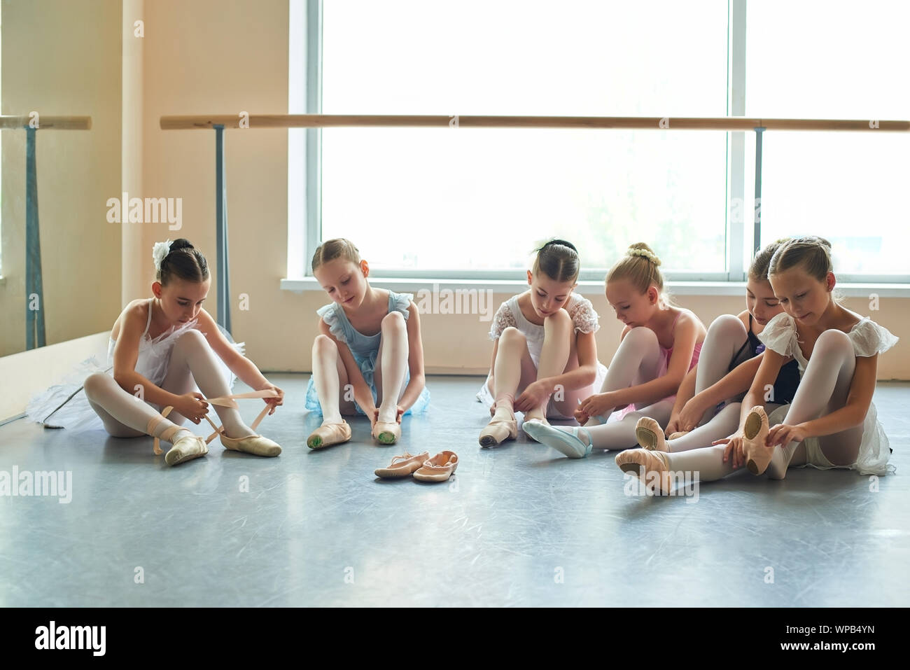 Putting on ballet shoes hi-res stock photography and images - Alamy