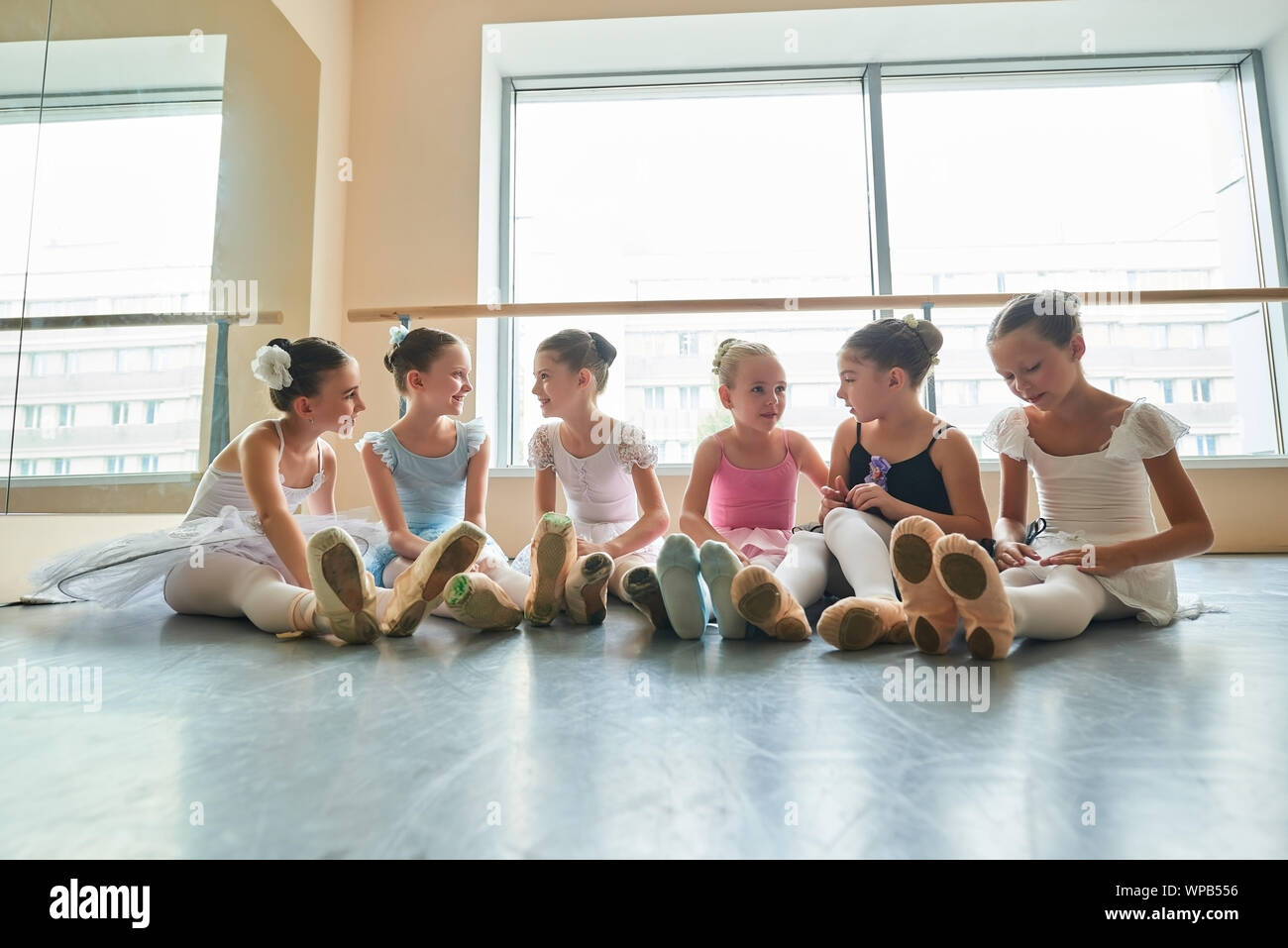 Happy young ballerina sitting on hi-res stock photography and images ...