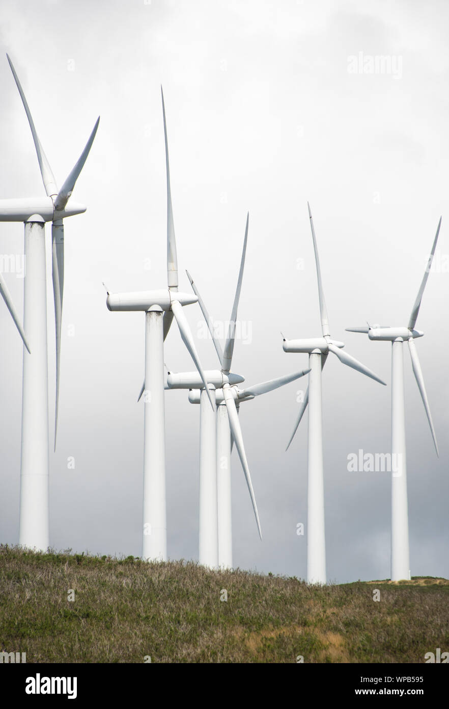 Wind power plant on hilltop in Europe Stock Photo - Alamy