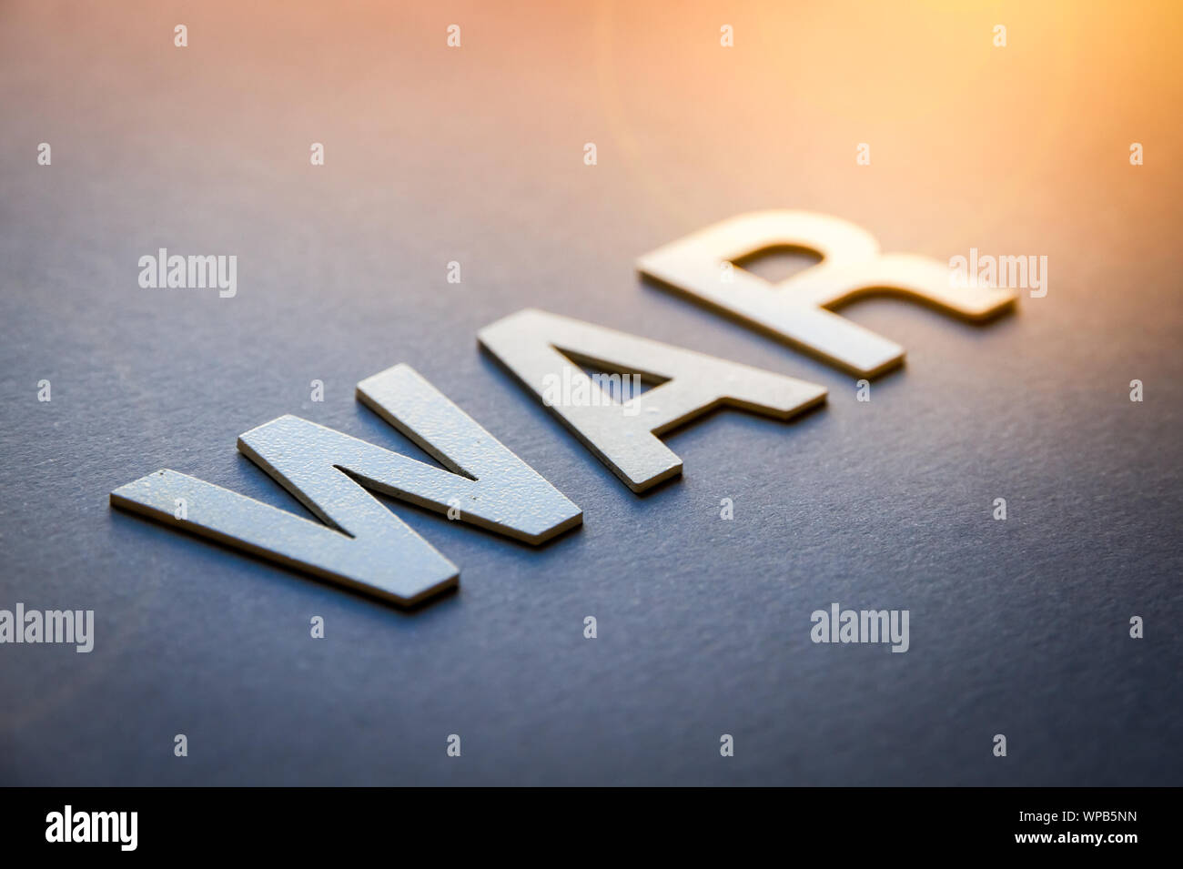 Word war written with white solid letters on a board Stock Photo - Alamy
