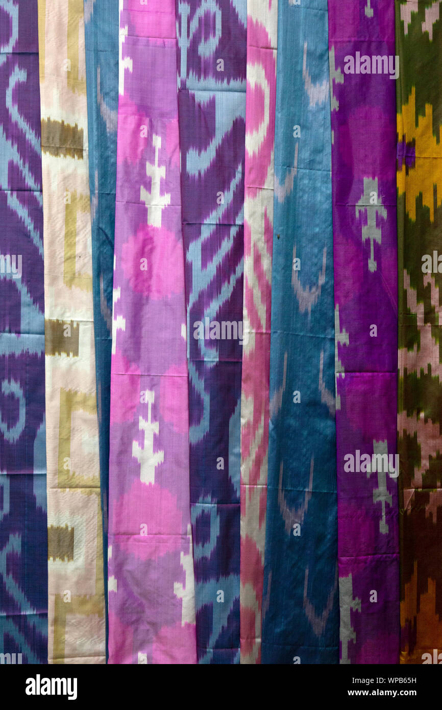 Traditional designs on textiles and clothes from Uzbekistan Stock Photo ...