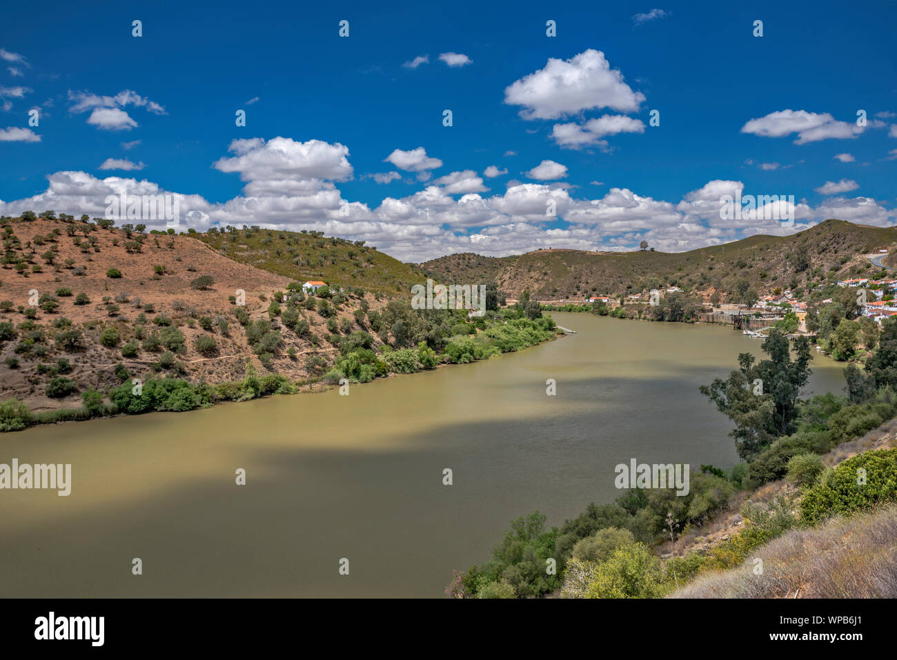 Rio Guadiana, view from Spanish side, village of Pomarao in Portugal in ...