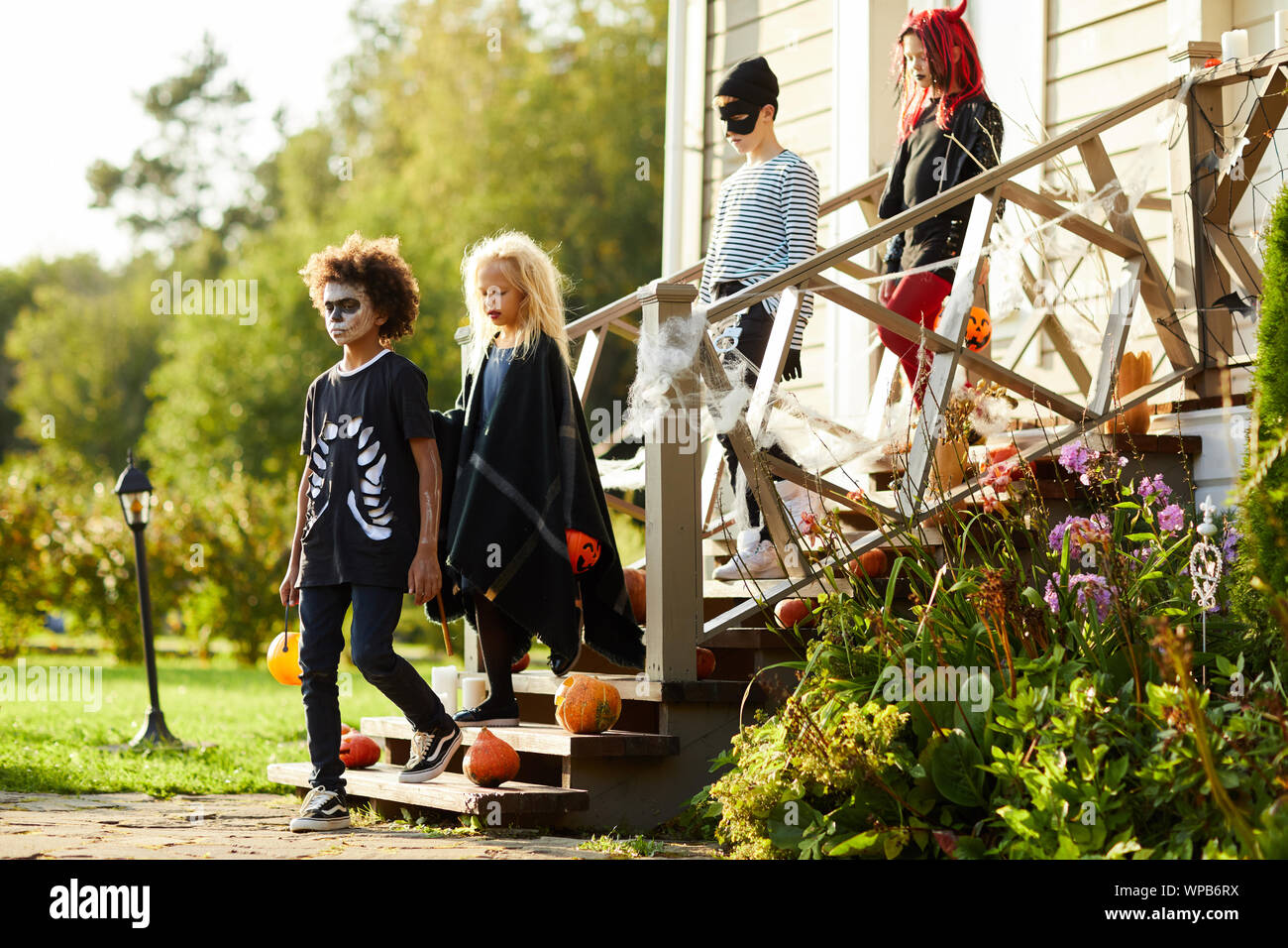 Boy girl walking up stairs hi-res stock photography and images - Alamy