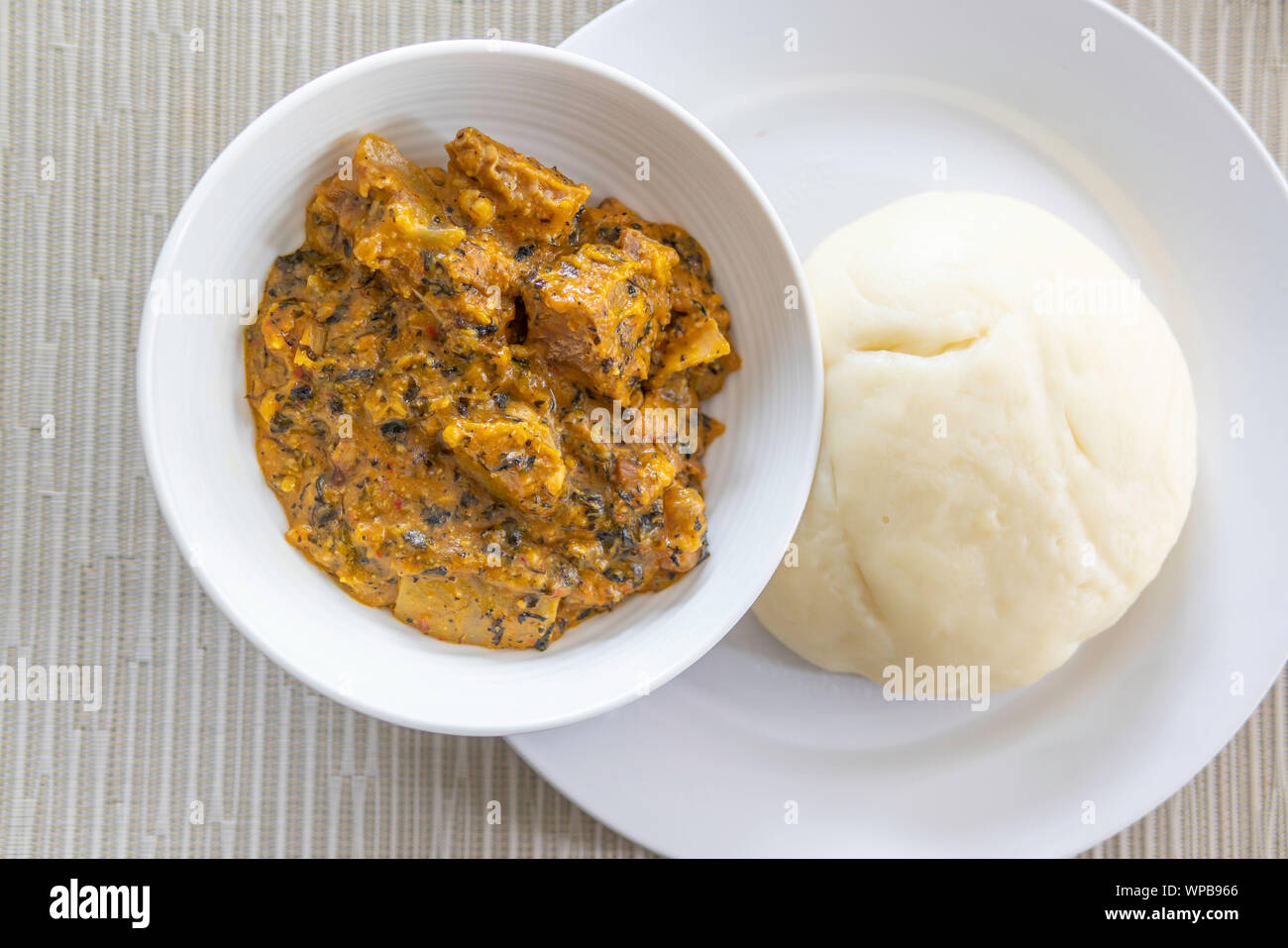 Nigerian Pounded Yam served with Spicy Bitterleaf soup Stock Photo - Alamy