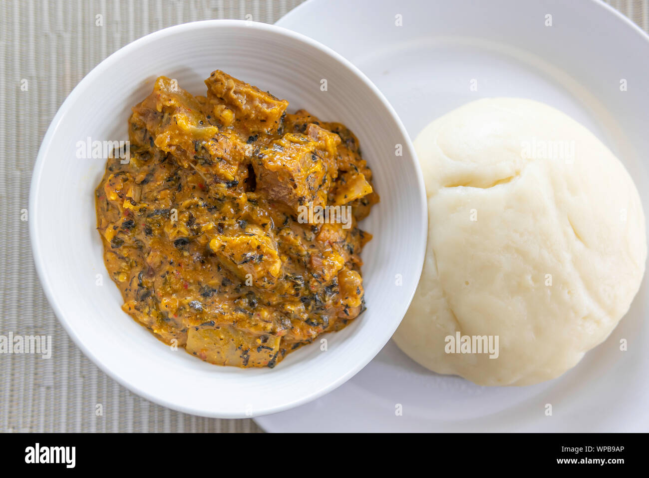 Nigerian Pounded Yam served with Spicy Bitterleaf soup Stock Photo - Alamy