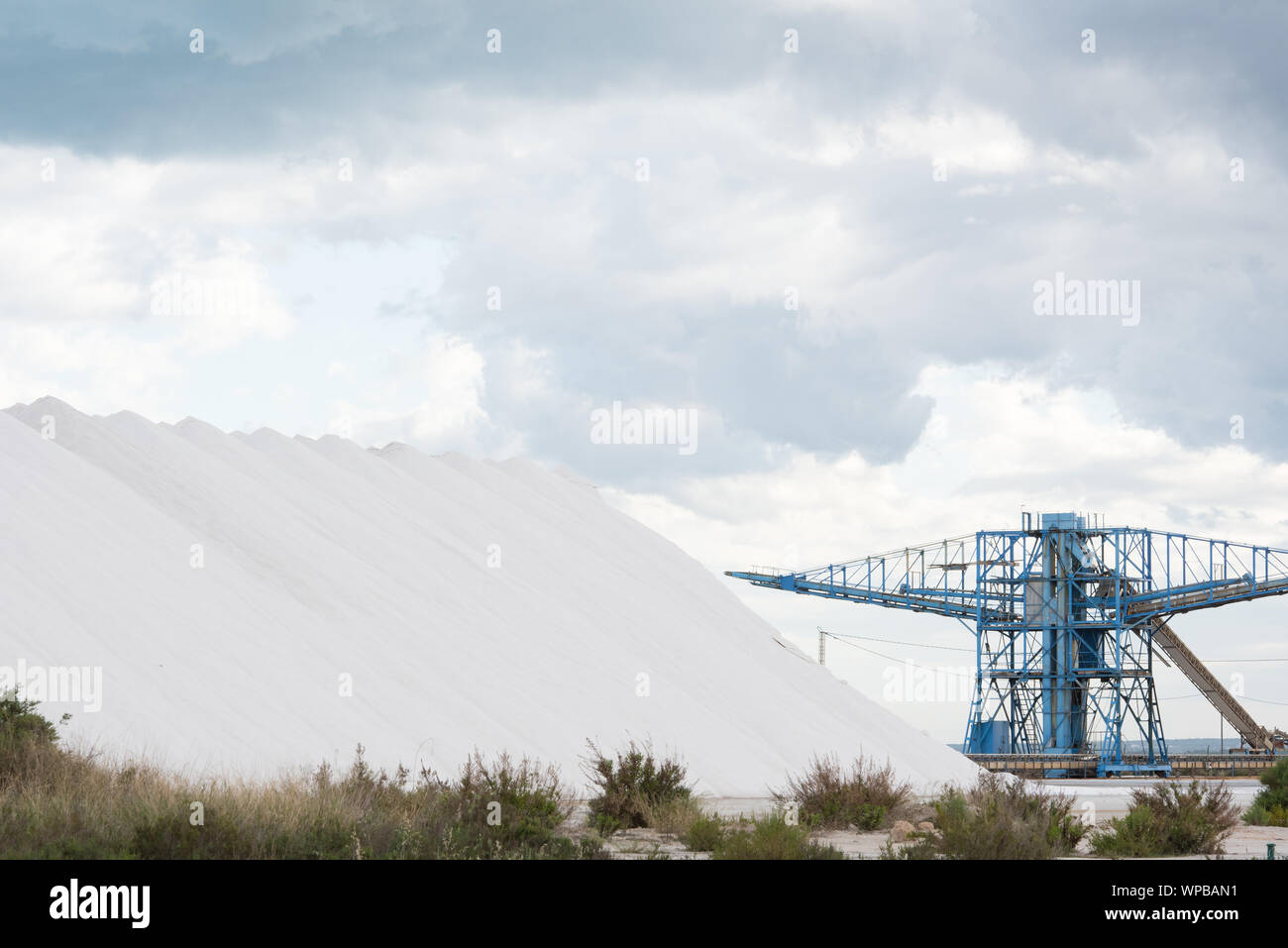 hill of sea salt from saline production site at coast of Mediterranean ...