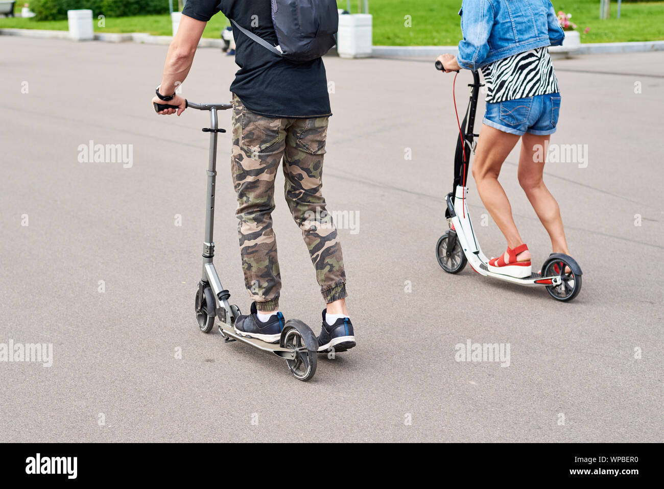 Ride electric scooters hi-res stock photography and images - Alamy