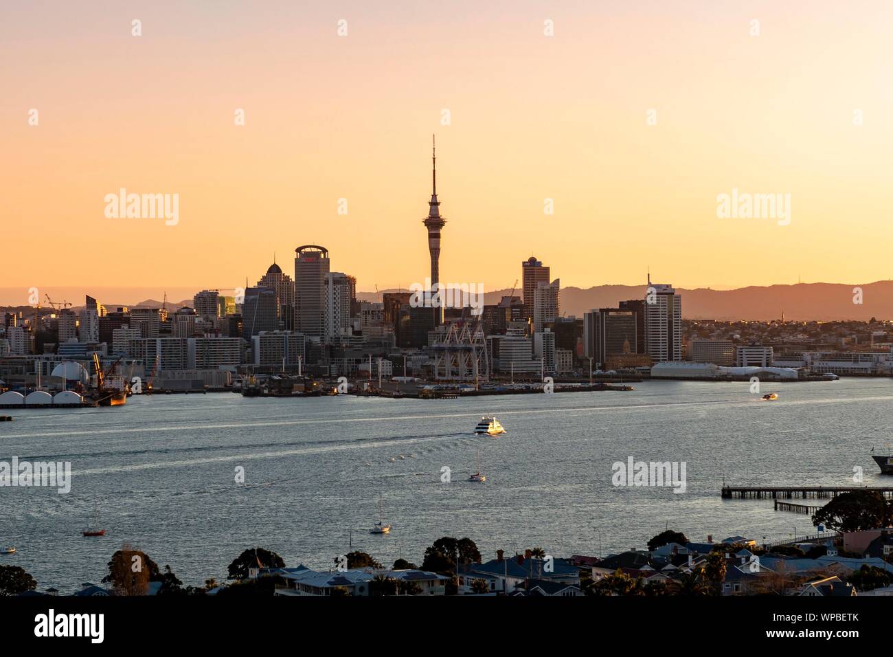 Skyline of Auckland at sunset, Waitemata Harbour, Sky Tower, Central ...