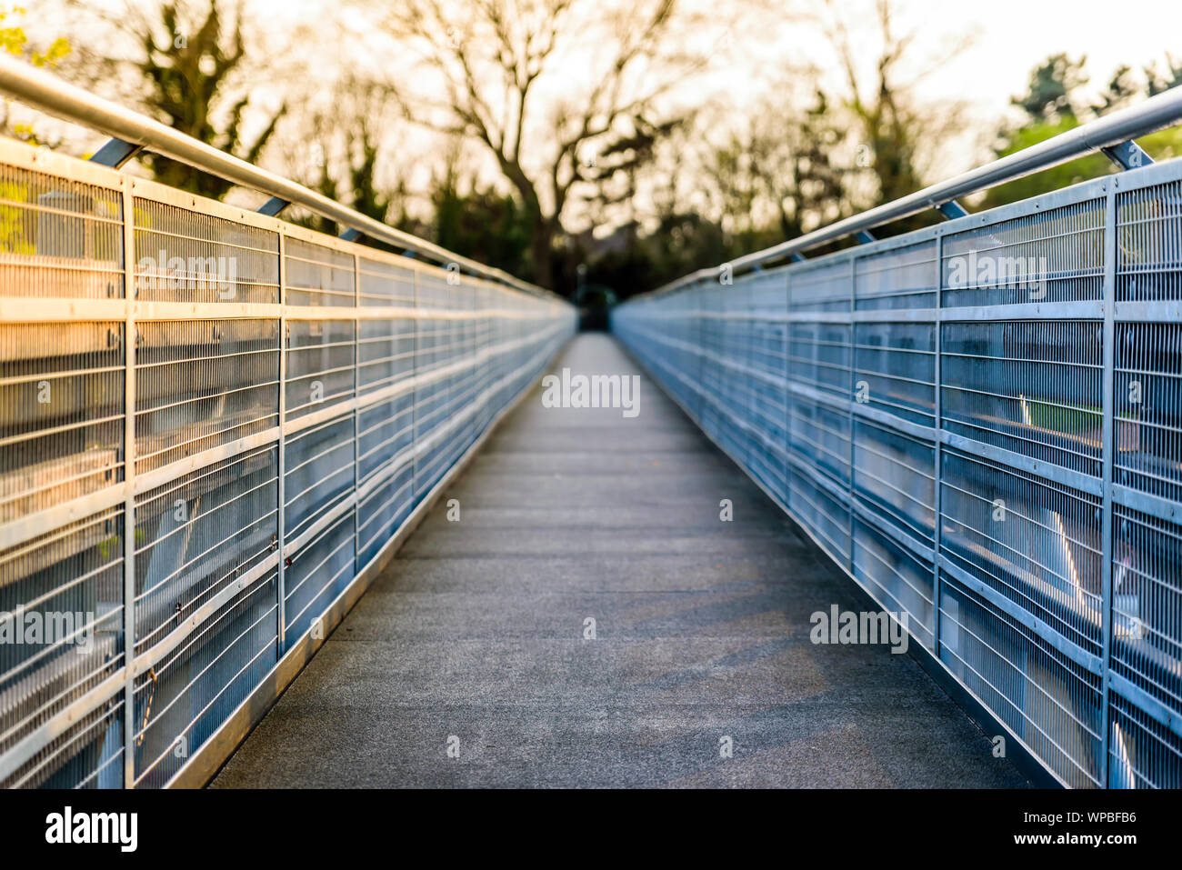 pedestrian bridge over uk motorway in evening england Stock Photo - Alamy