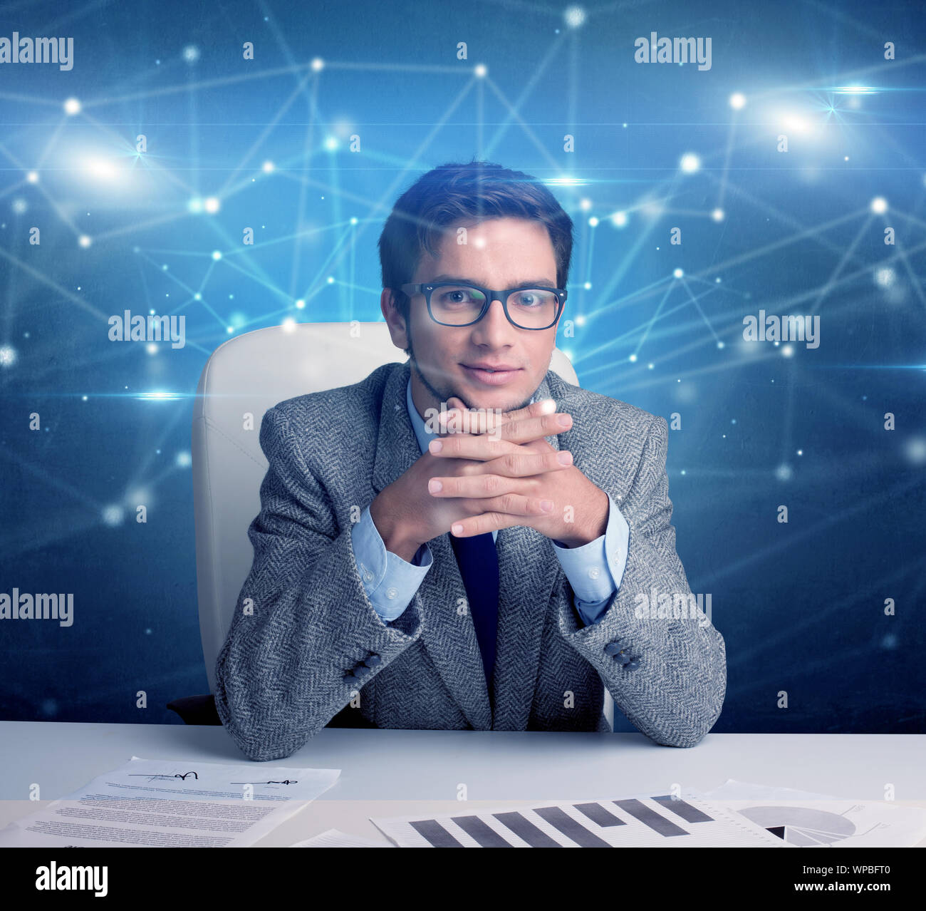 Manager in front of the office desk with networking concept Stock Photo ...