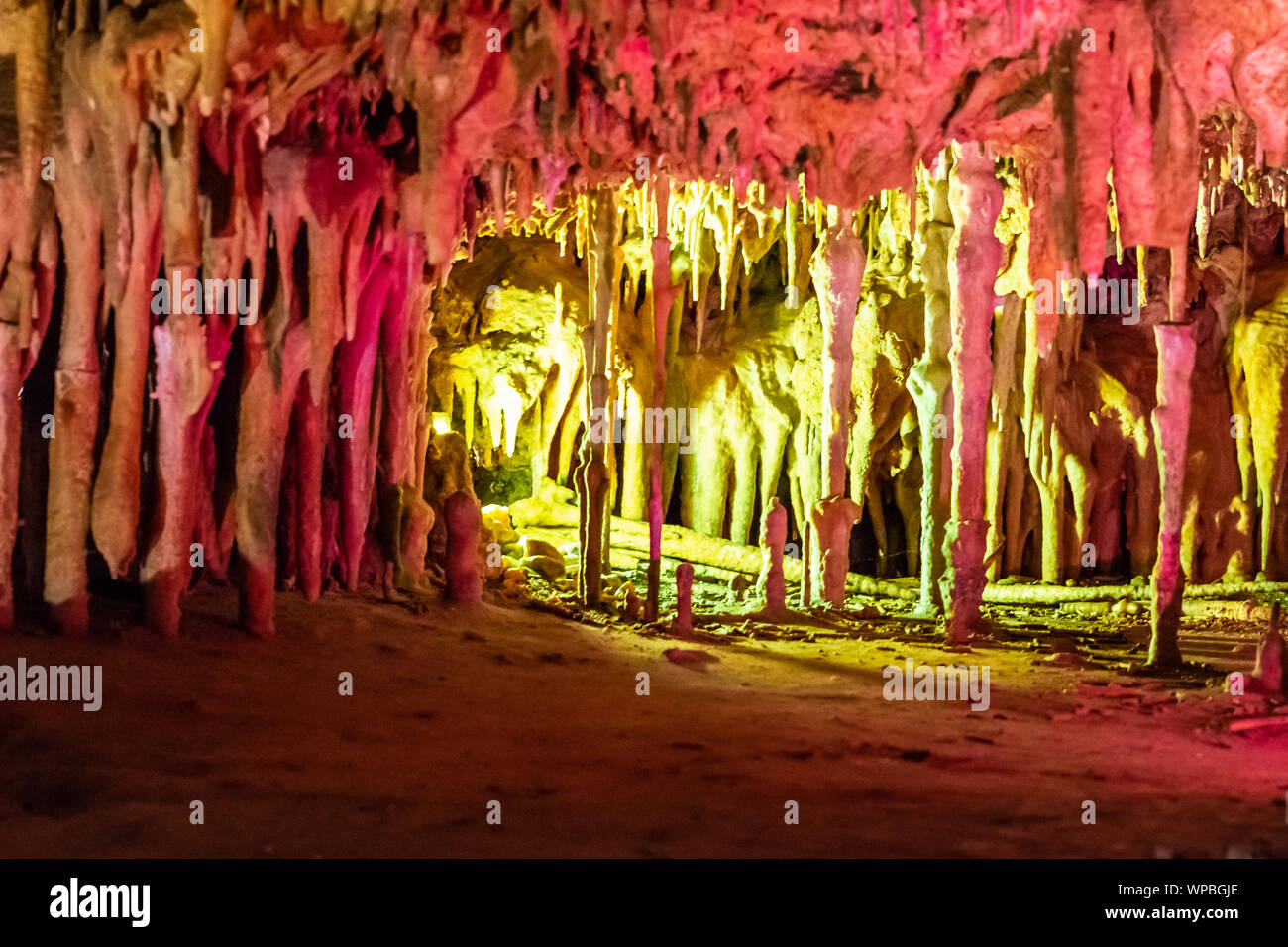 Formations of stalactites and stalagmites in a cave Stock Photo - Alamy