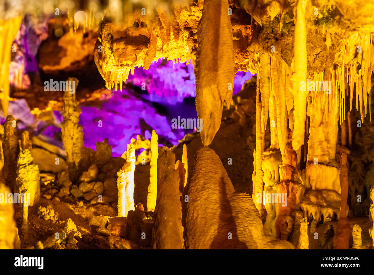 Formations of stalactites and stalagmites in a cave Stock Photo - Alamy