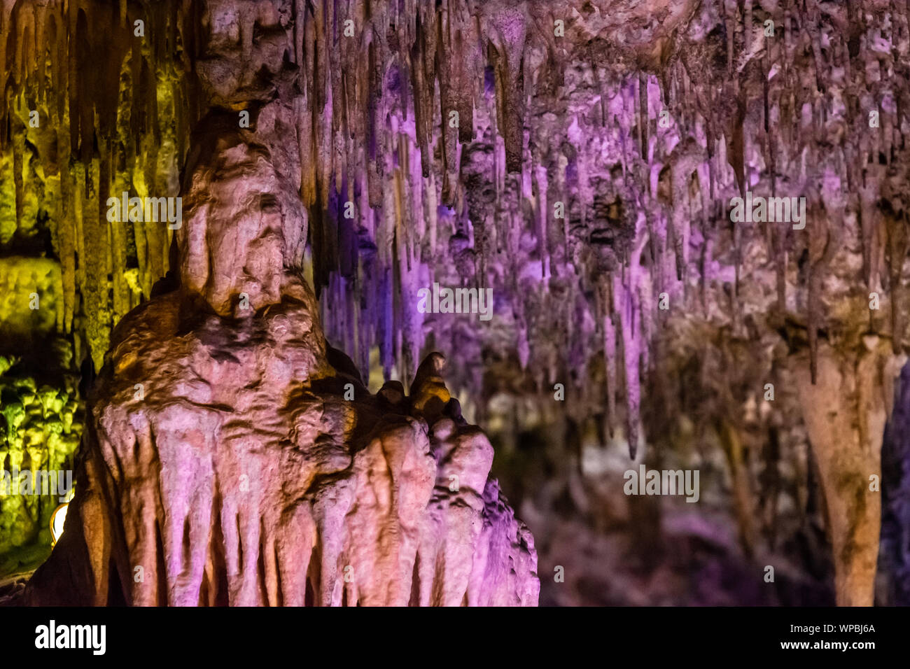 Formations of stalactites and stalagmites in a cave Stock Photo - Alamy
