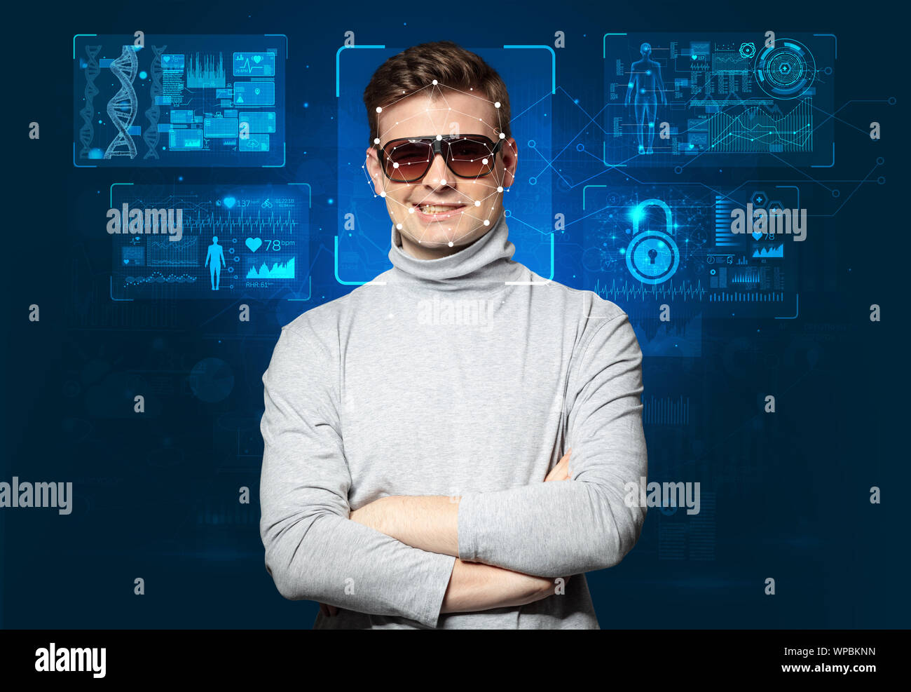 Biometric verification - young man face recognition Stock Photo - Alamy