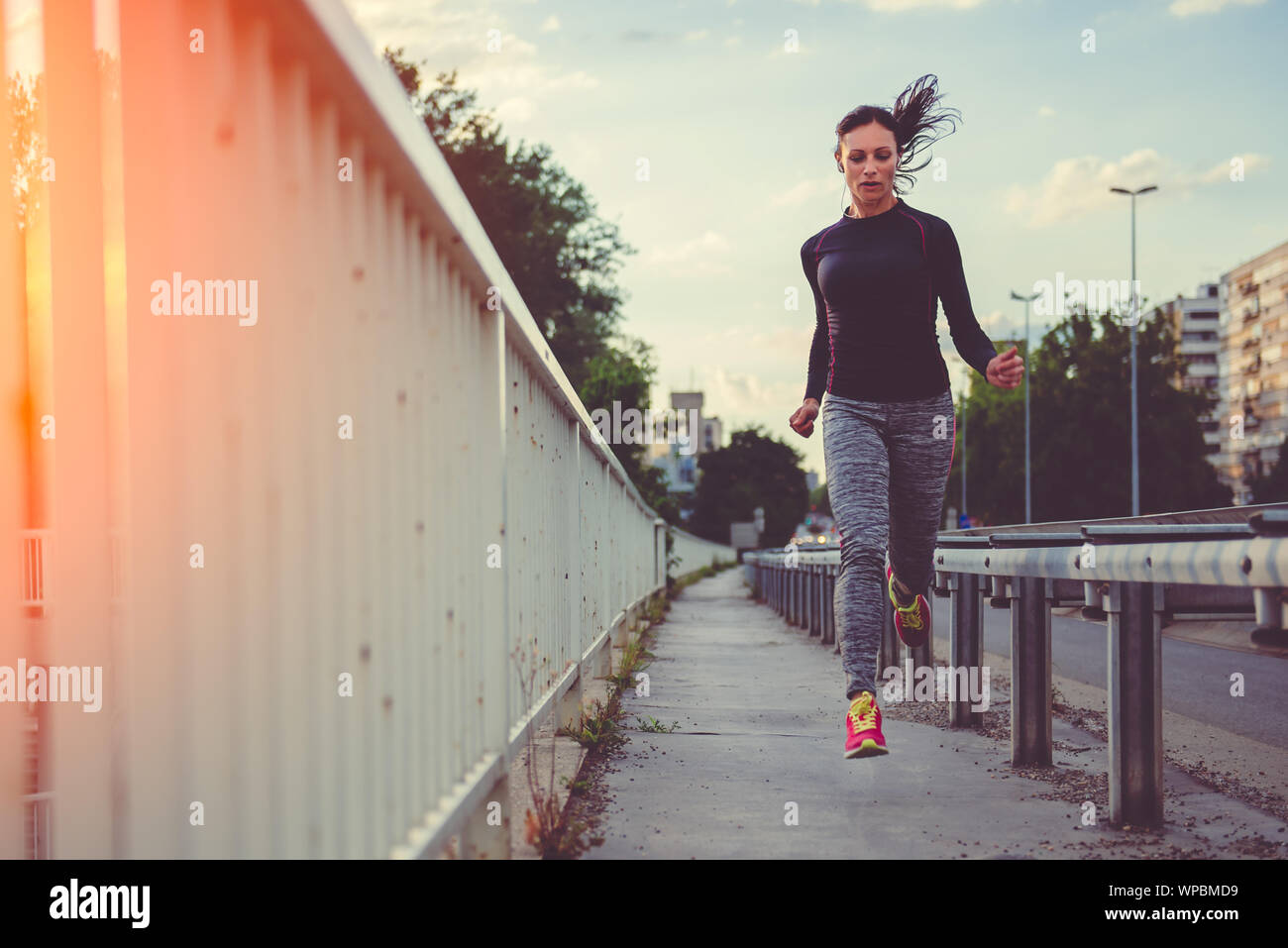 Women running city hi-res stock photography and images - Alamy