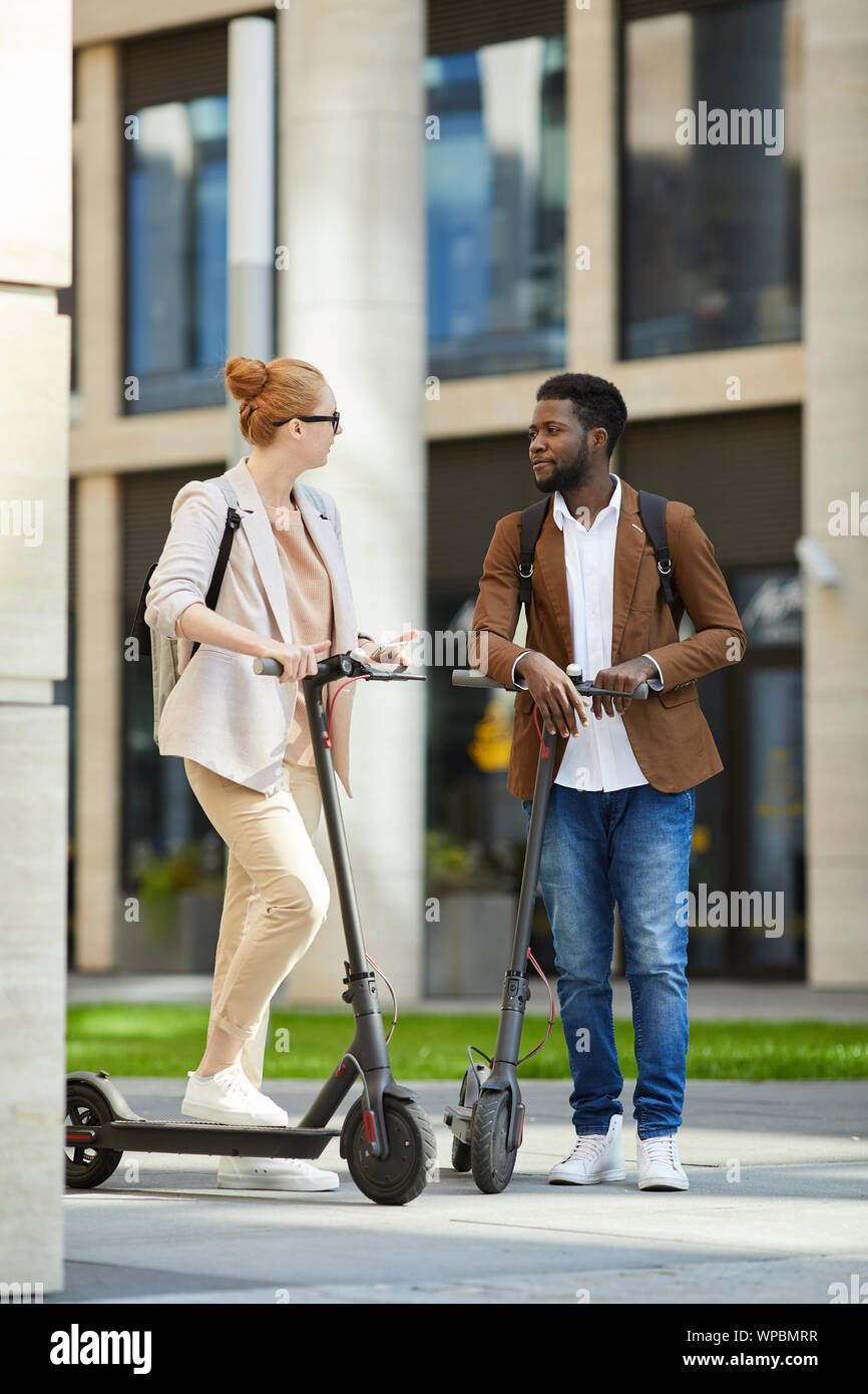 Two men scooters hi-res stock photography and images - Alamy