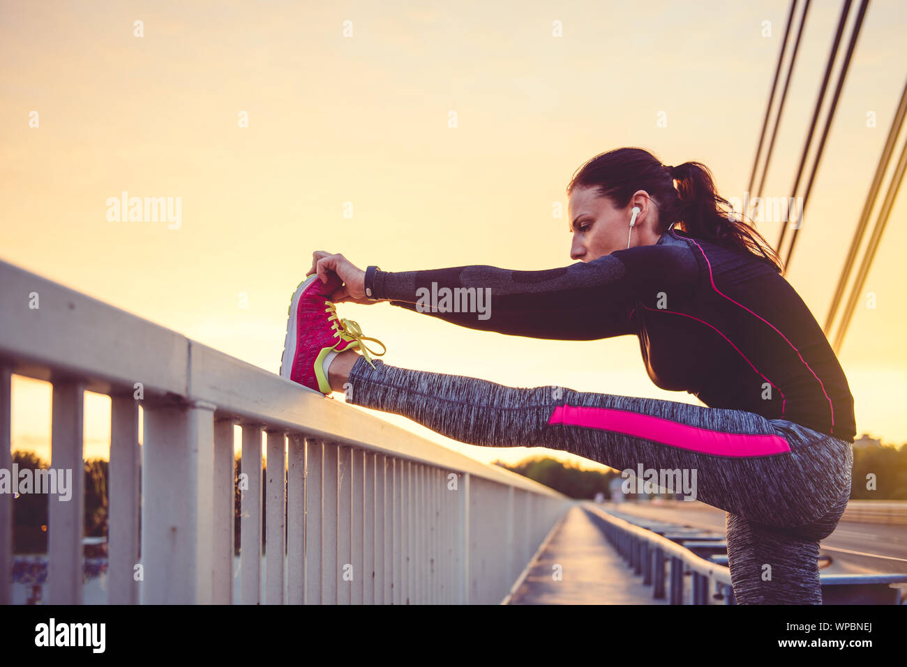 Warming up and stretching hi-res stock photography and images - Alamy
