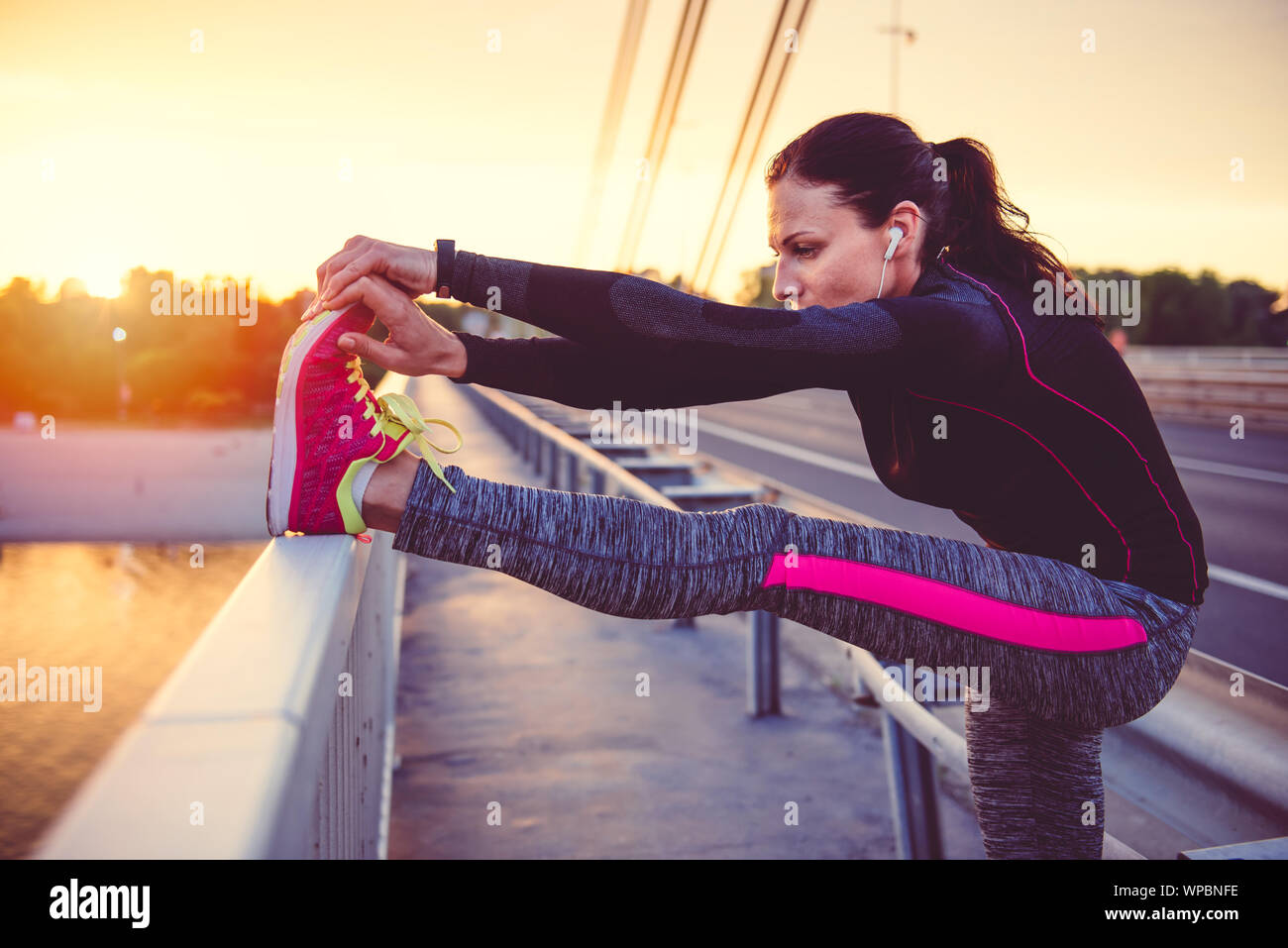 Fitness woman doing stretching exercise Stock Photo - Alamy