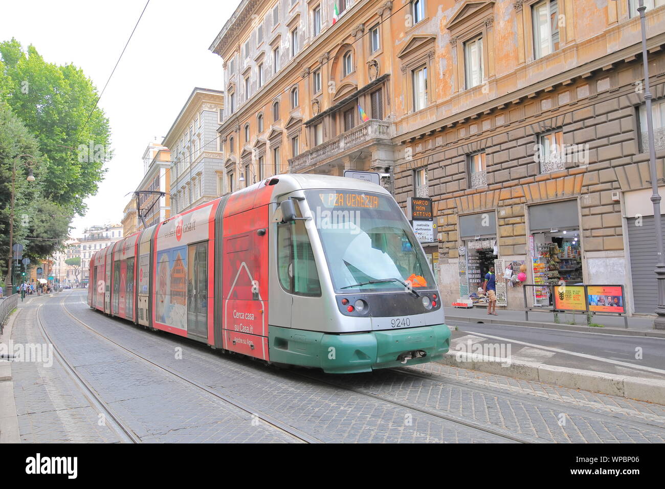 Tram train run through downtown Rome Italy Stock Photo - Alamy