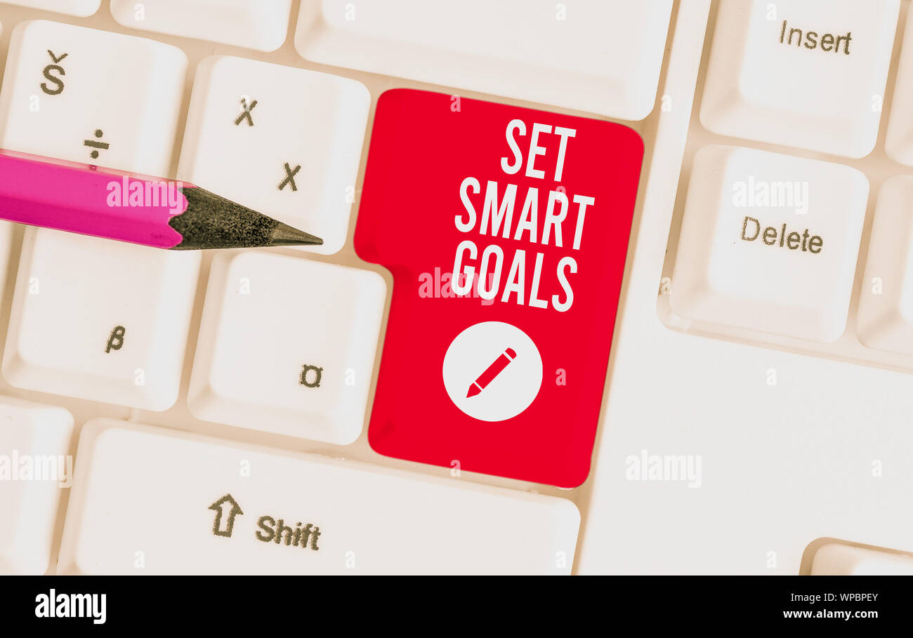 Writing note showing Set Smart Goals. Business concept for giving ...