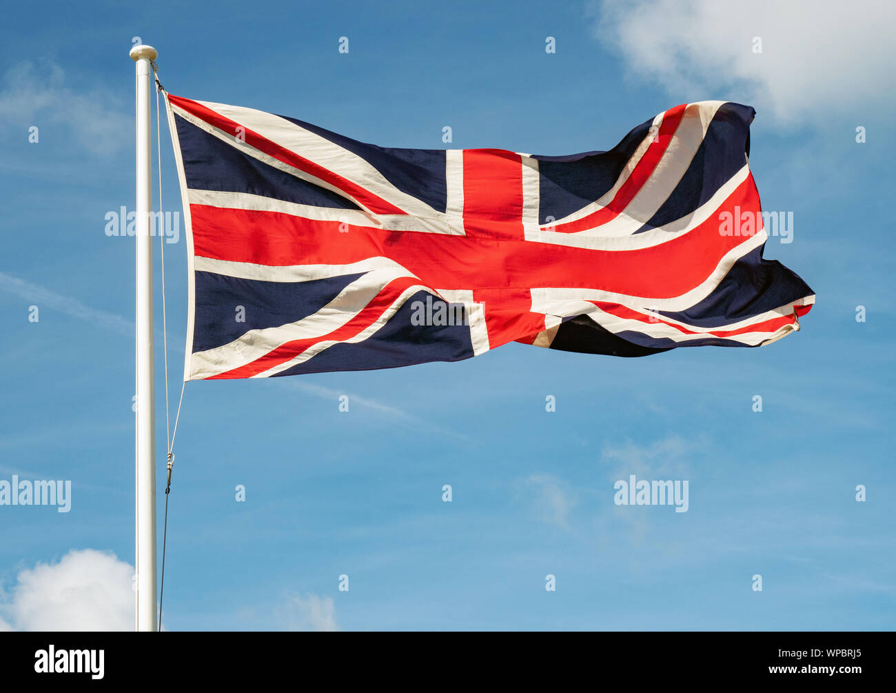 A Union Jack flag flying in the wind at Mont Orgueil Castle, Gorey ...