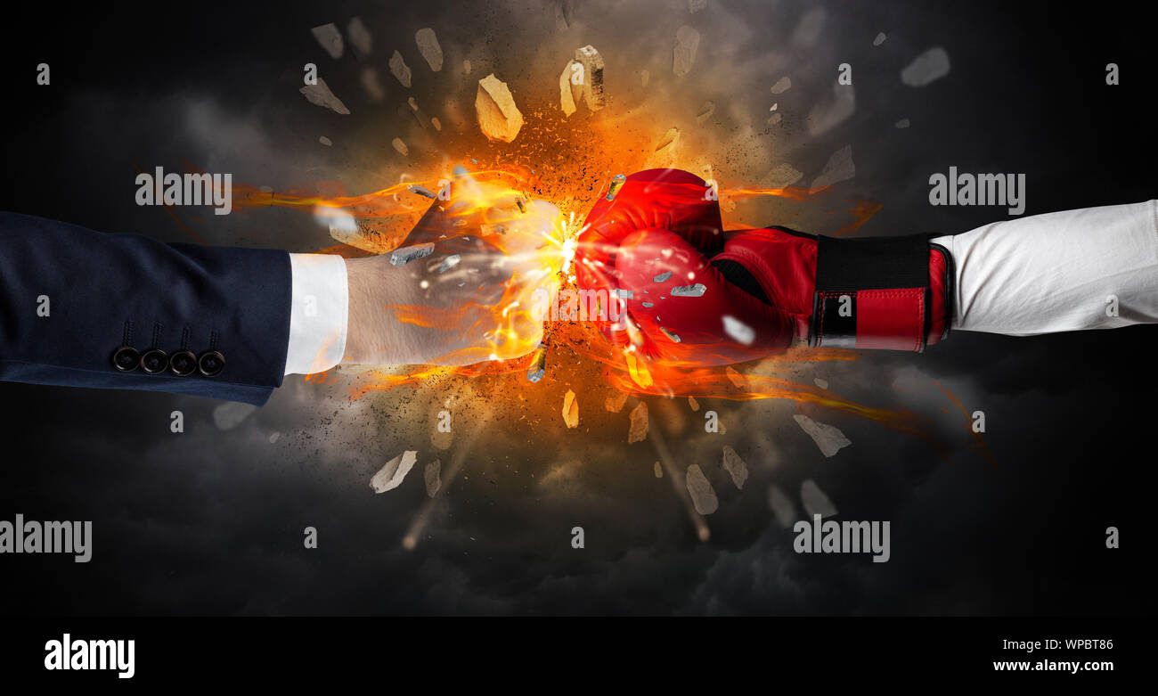 Two hands fighting and breaking a rock into small pieces Stock Photo ...