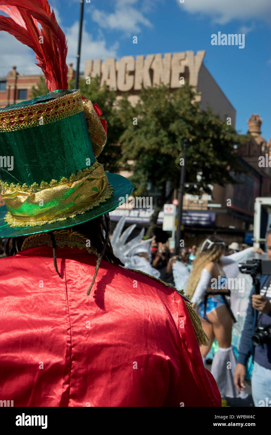 Dancers and musicians on parade enjoying Hackney Carnival in the streets of Hackney, London ...