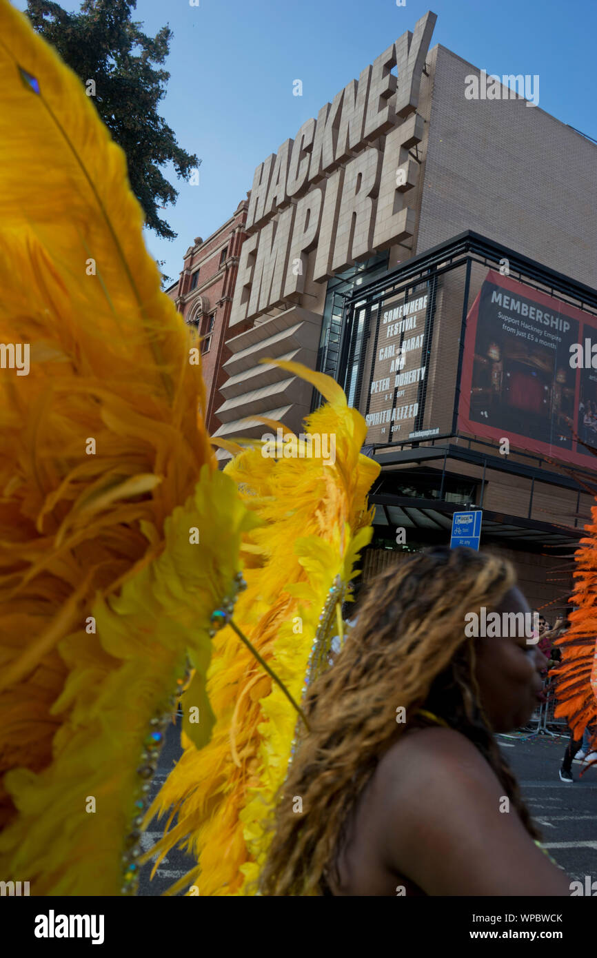 Dancers and musicians on parade enjoying Hackney Carnival in the streets of Hackney, London ...