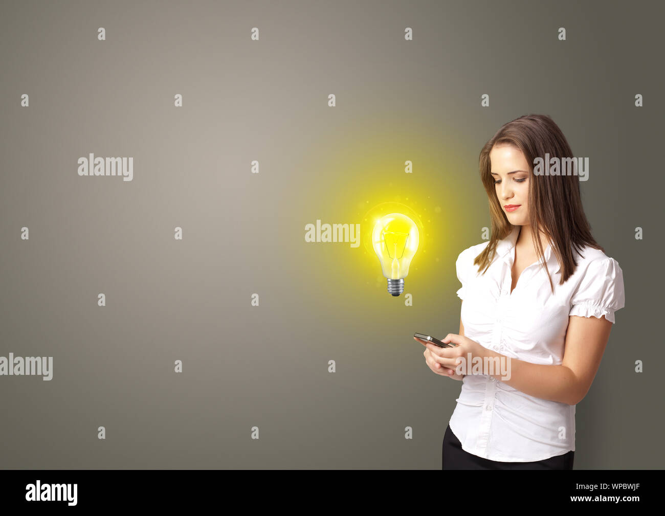 Young smiling person presenting new idea concept Stock Photo - Alamy