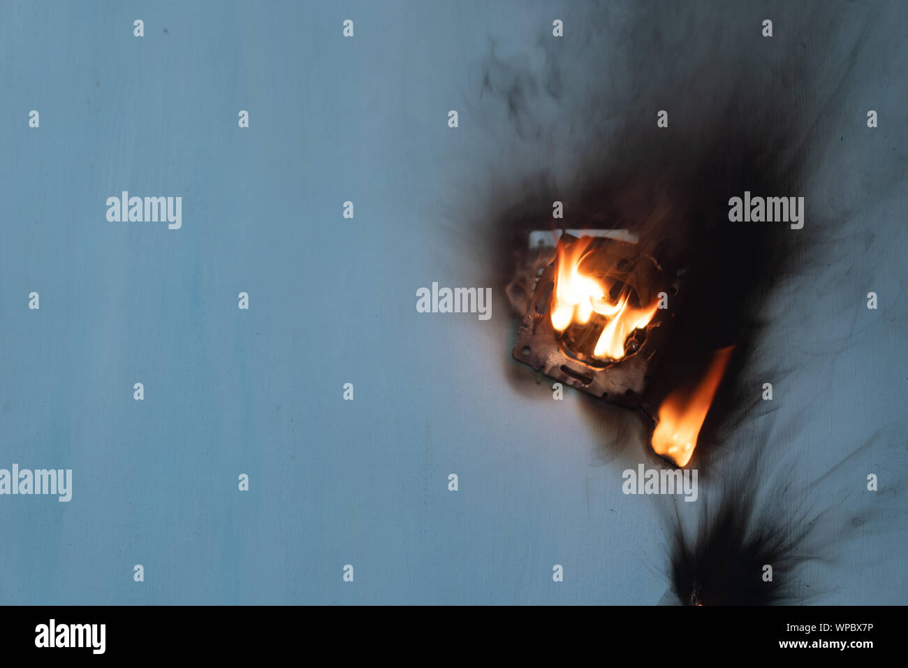 Apartment fire is caused by electrical outlet faults. Burnt and damaged ...