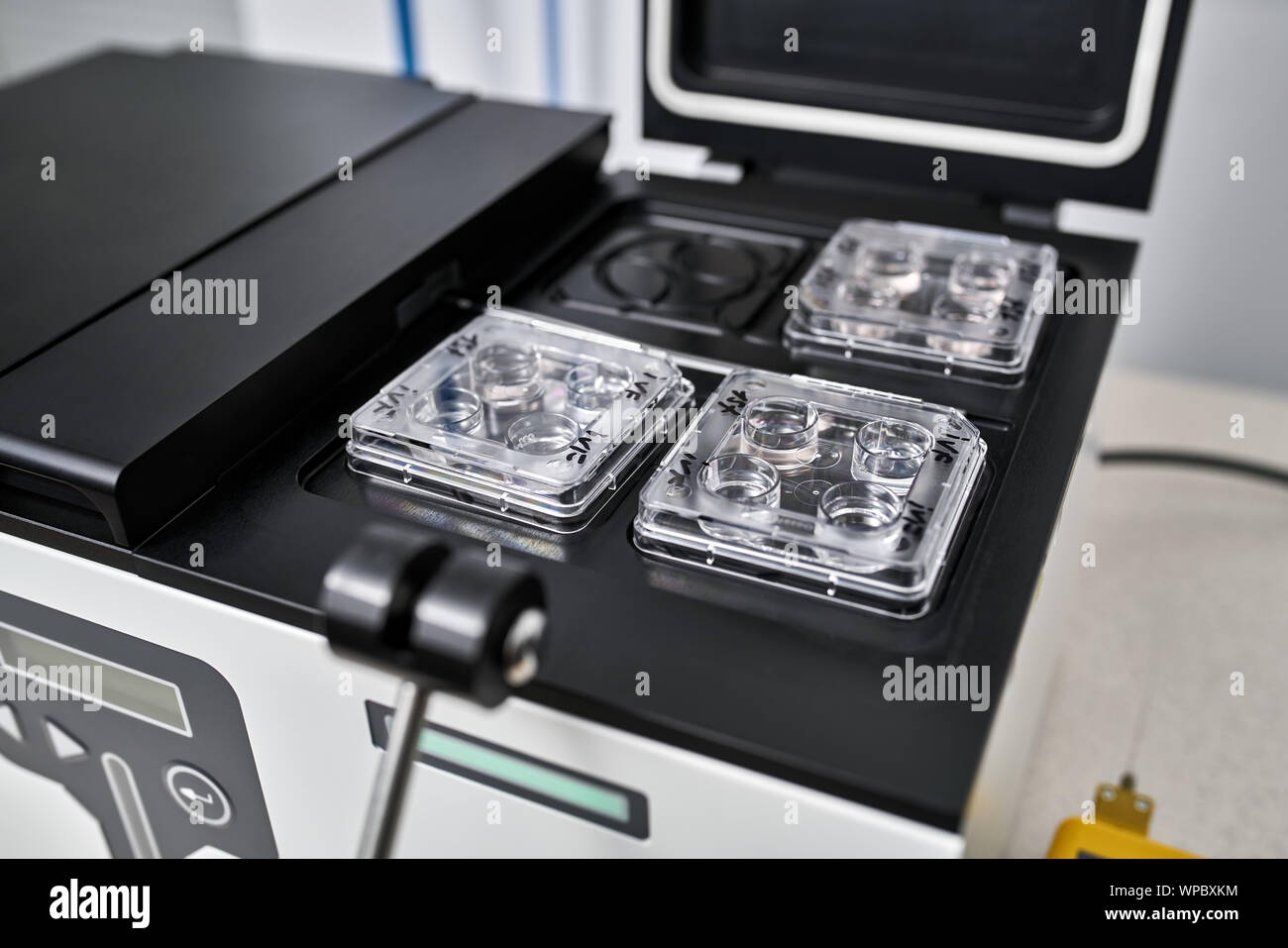 IVF incubator with opened cover in the laboratory of the in vitro ...