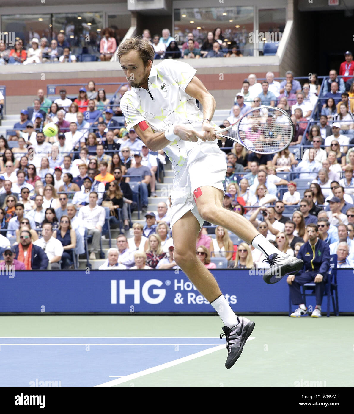 Daniil Medvedev of Russia hits a leaping backhand to Rafael Nadal of ...