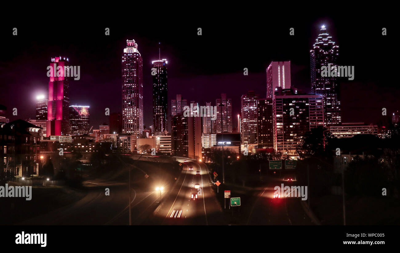 Night shot of traffic moving into and out of downtown Atlanta, Georgia ...