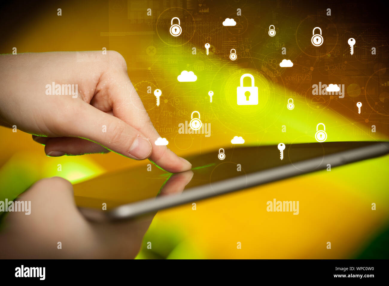 Hand holding tablet with online security system concept Stock Photo - Alamy