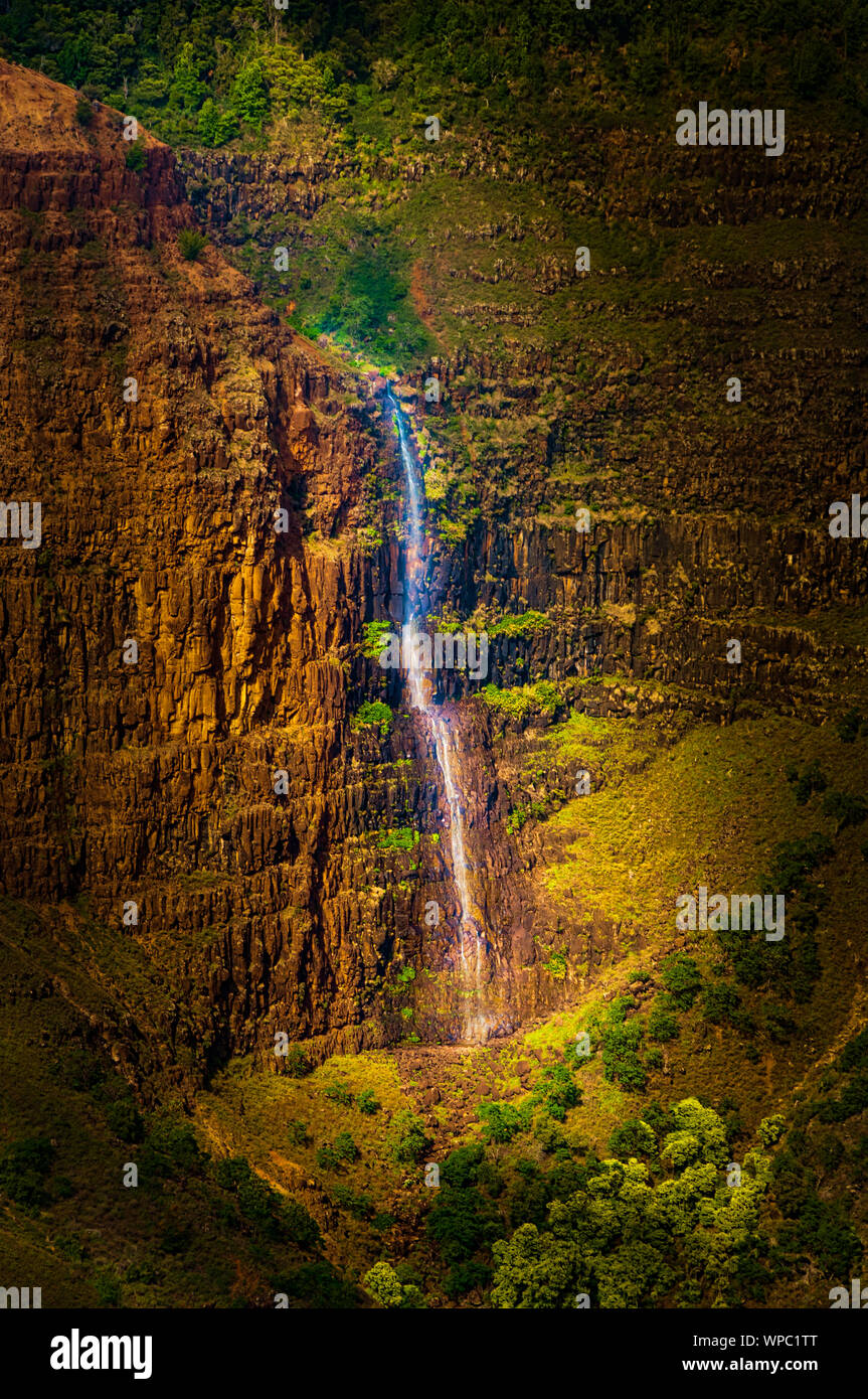Overlooking Waimea Falls in Waimea Canyon State Park on the island of ...