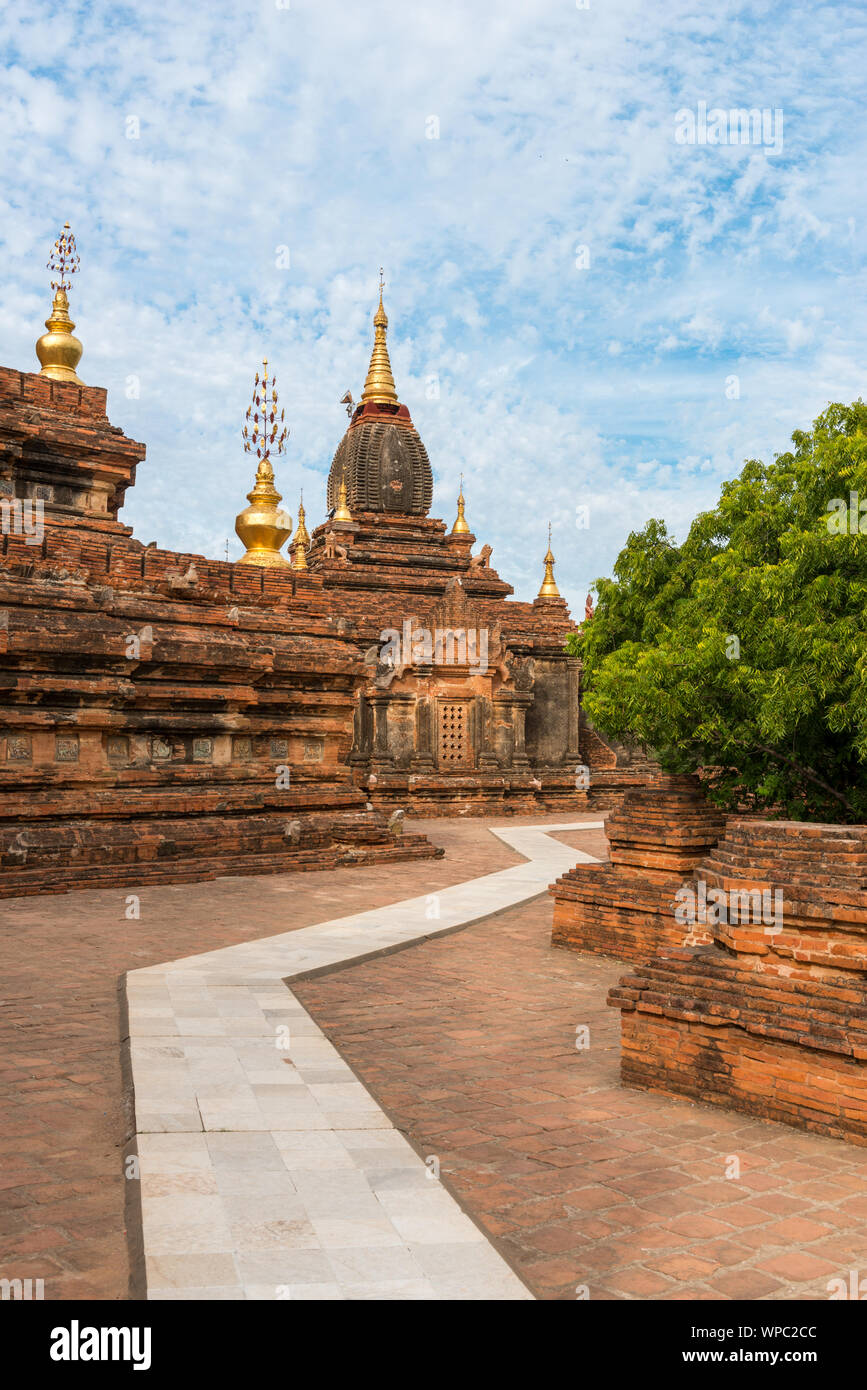 Vertical picture of the exterior area of Dhammayazika Pagoda located ...