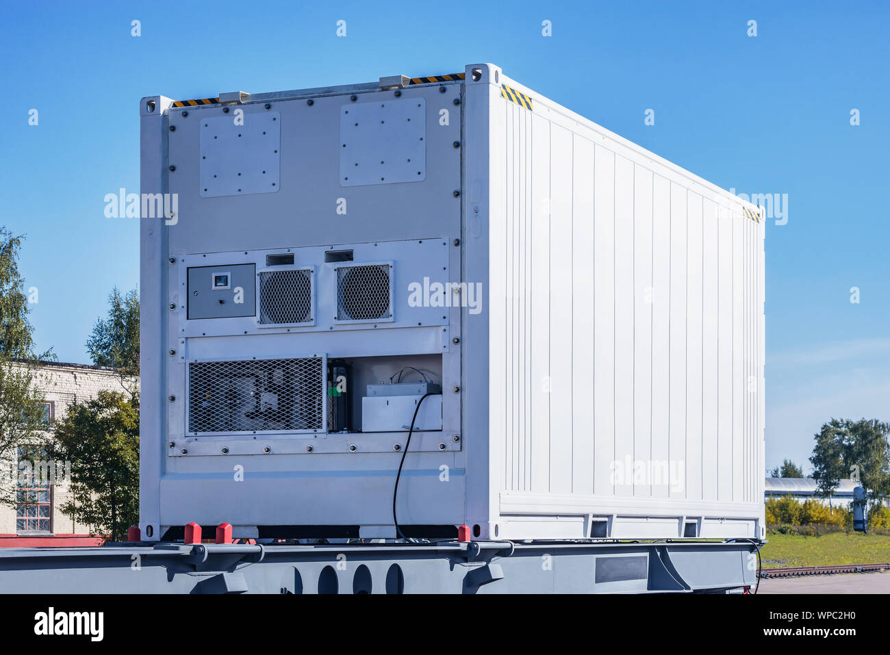 Refrigerated container 20-foot-long on the railway platform Stock Photo ...