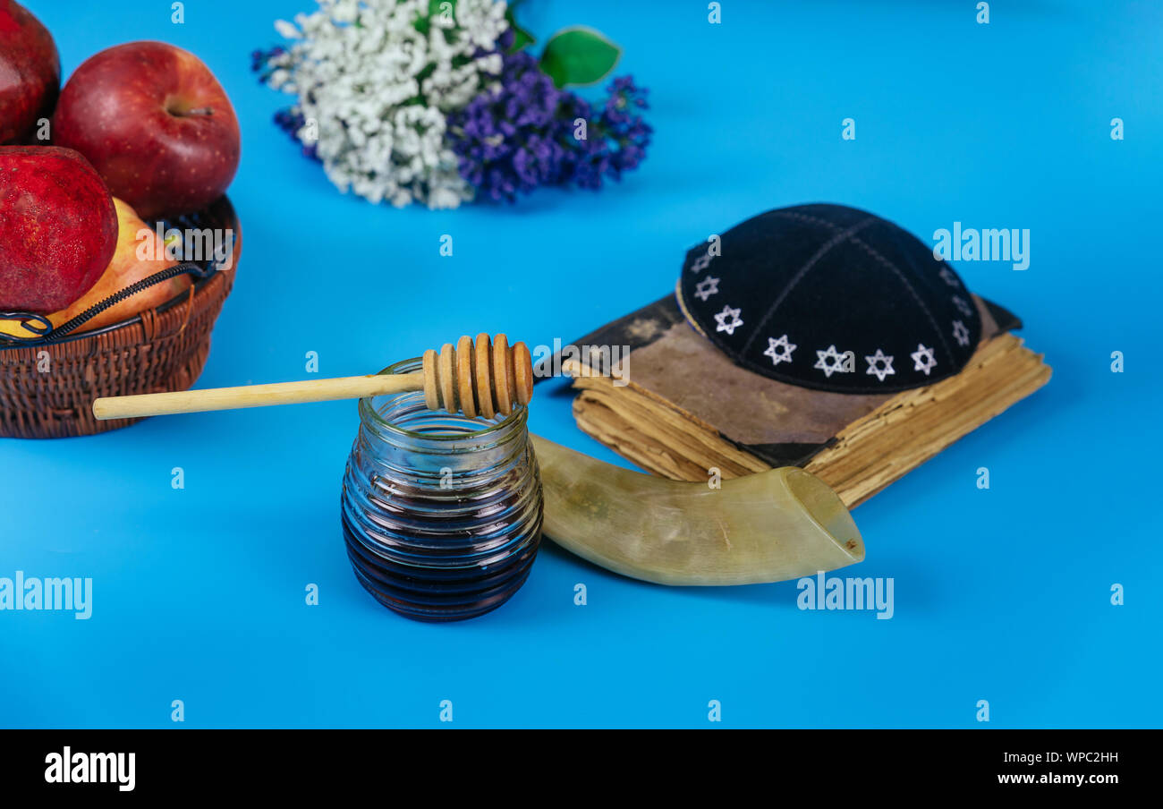 Honey on the pomegranate and apples. Jewishs new year Rosh Ha Shana ...