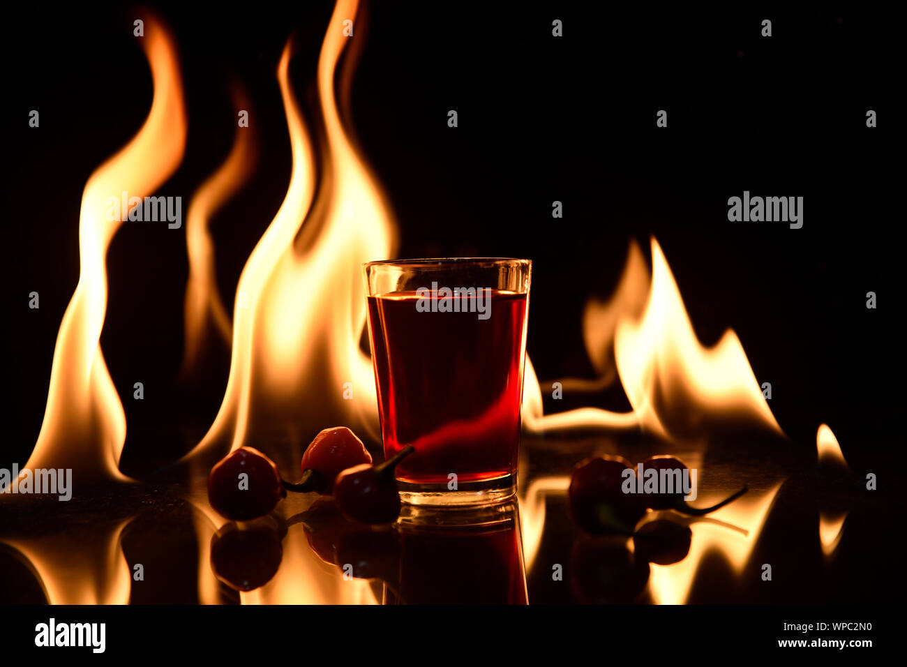 Red drink fire behind hi-res stock photography and images - Alamy
