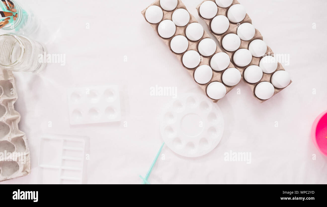 Flat lay. Painting craft Easter eggs with acrilic paint Stock Photo - Alamy