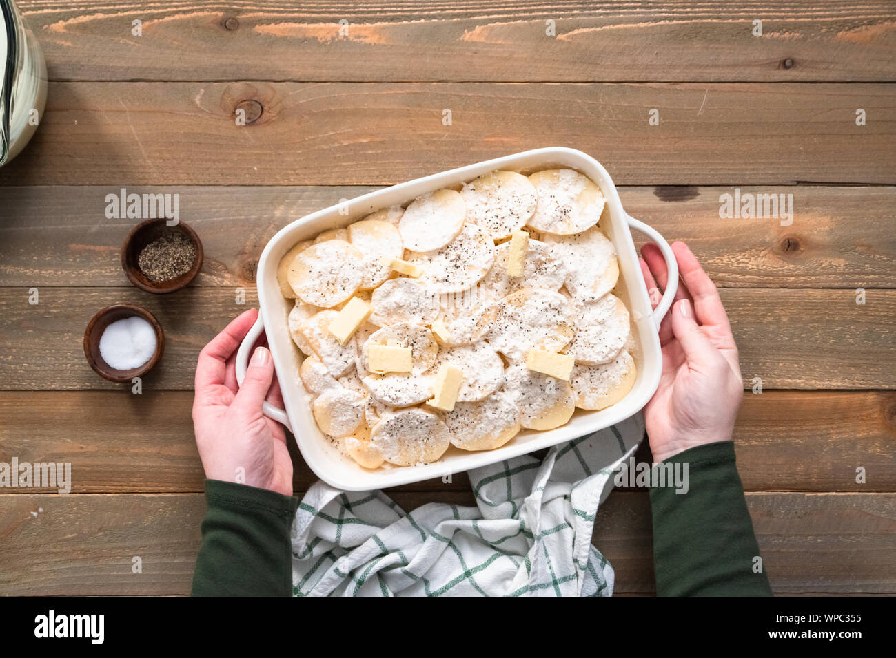 Flat lay. Cooking scalloped potatoes recipe with organic potatoes Stock ...