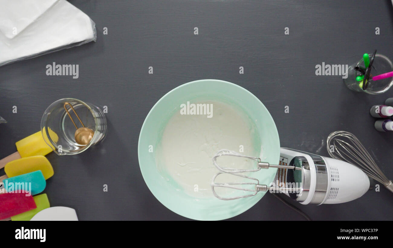 Step by step. Flat lay. Preparing simple royal icing to decorate sugar cookies Stock Photo - Alamy