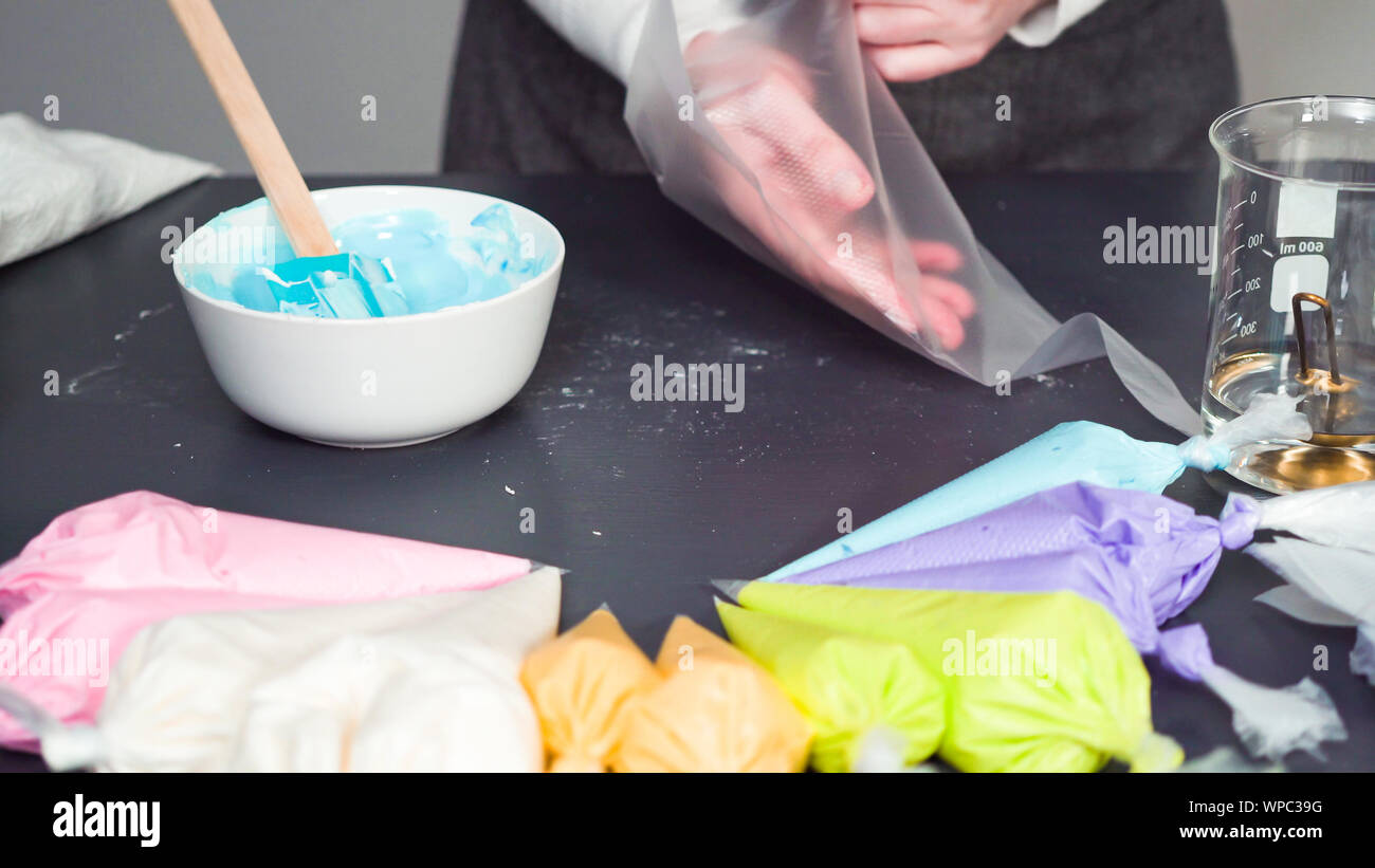 Step by step. Pouring royal icing into the piping bag to decorate sugar ...