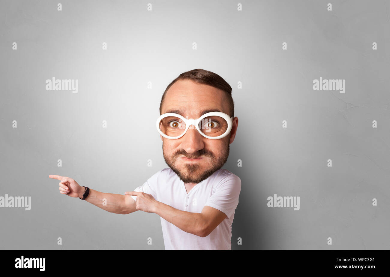 Big head on small body with copy space Stock Photo - Alamy