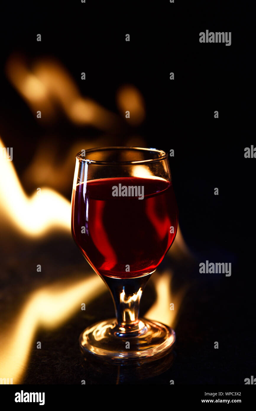 Red drink fire behind hi-res stock photography and images - Alamy