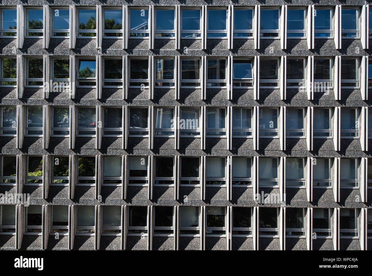 Symmetric facade modern residential building hi-res stock photography ...