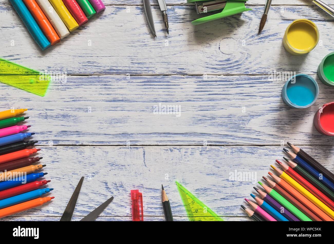 Creative concept with school supplies. Frame with school accessories ...