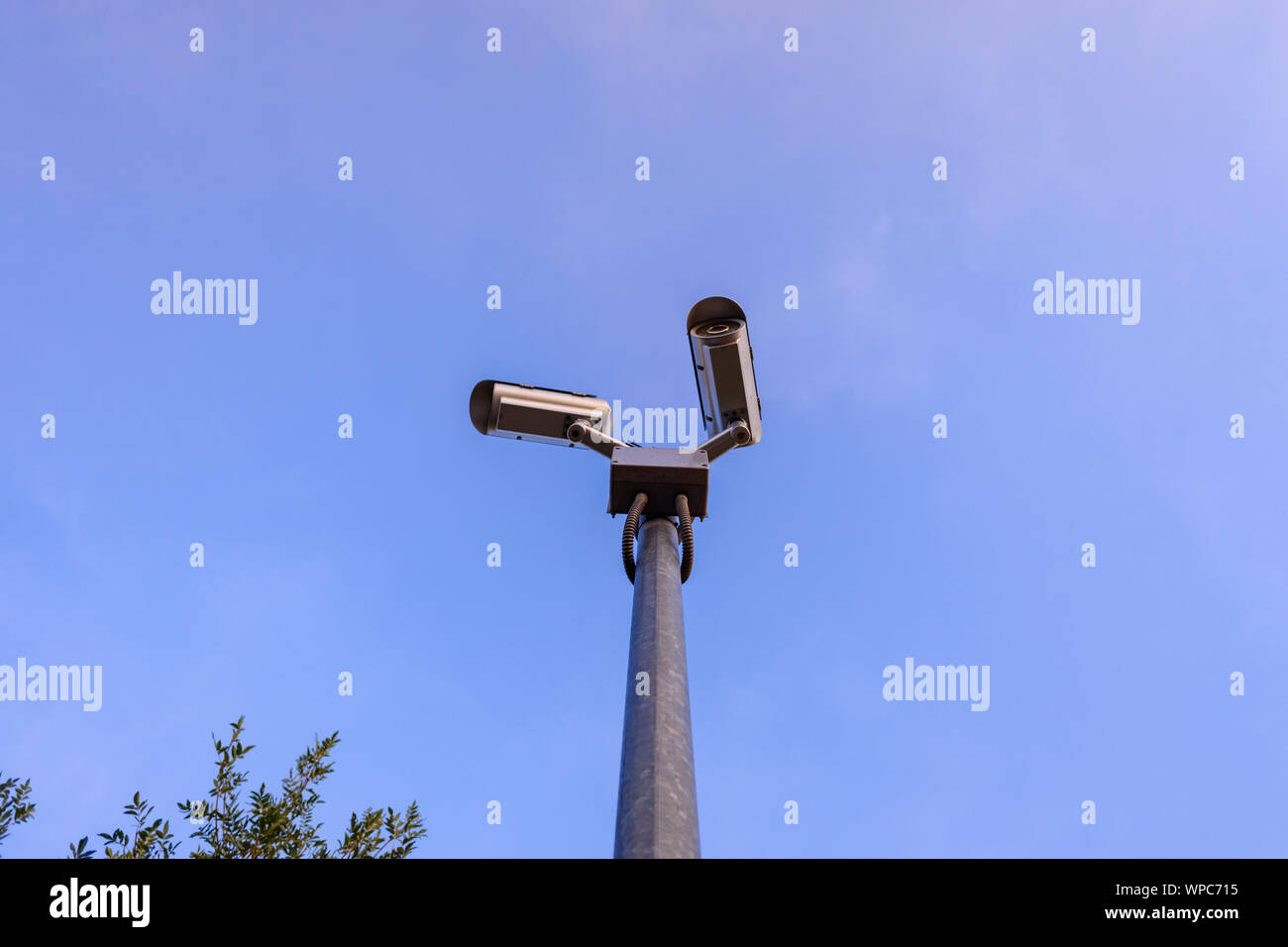 Security cameras to monitor people Stock Photo - Alamy
