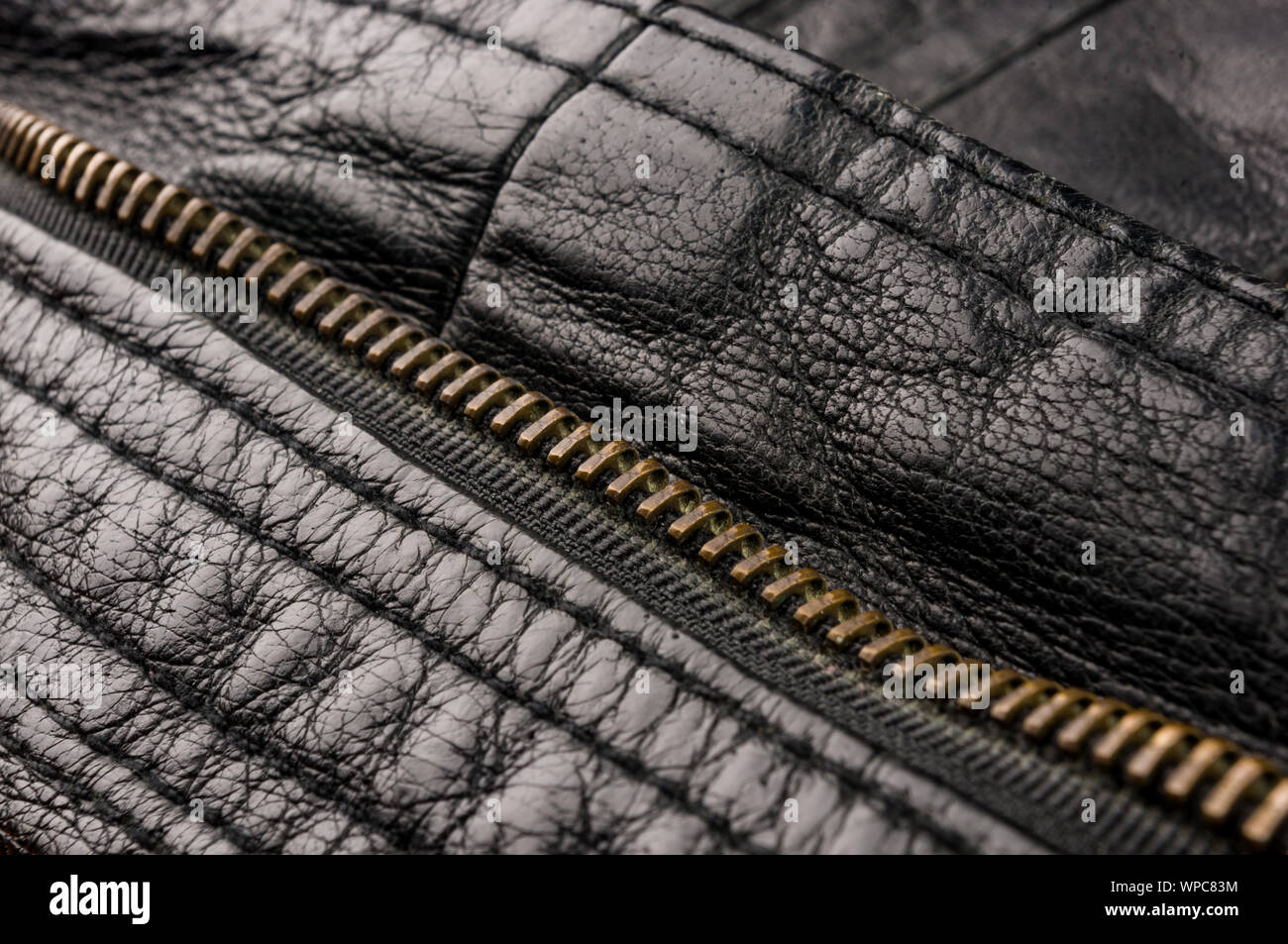 Old vintage genuine soft black leather texture background, top layer ...